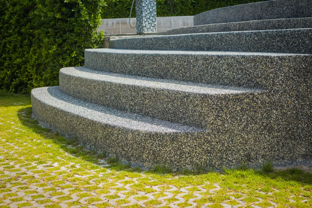 How to Pair Exposed Aggregate with a Modern Backyard | A Better Driveway